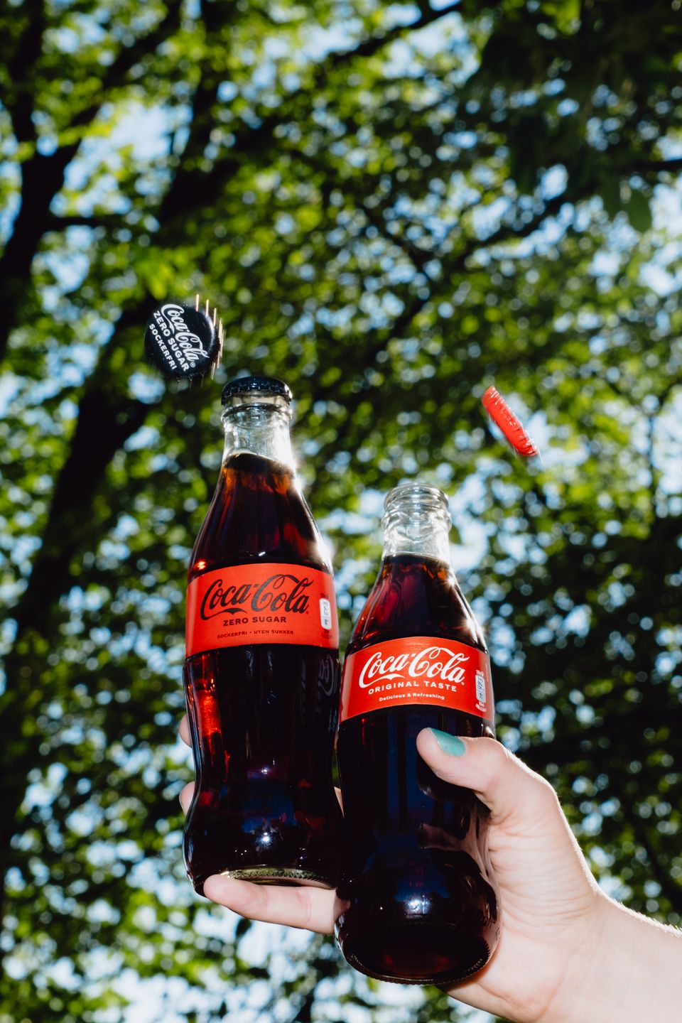 Femti år med tekst under korken | Coca-Cola Norge og Coca-Cola ...